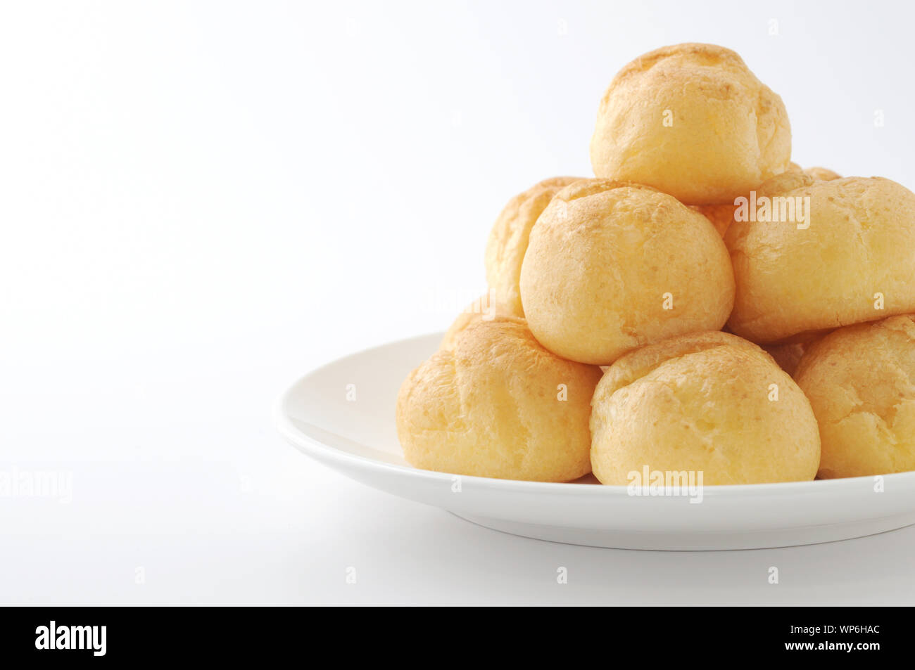 cream puffs closeup isolated on white background Stock Photo - Alamy