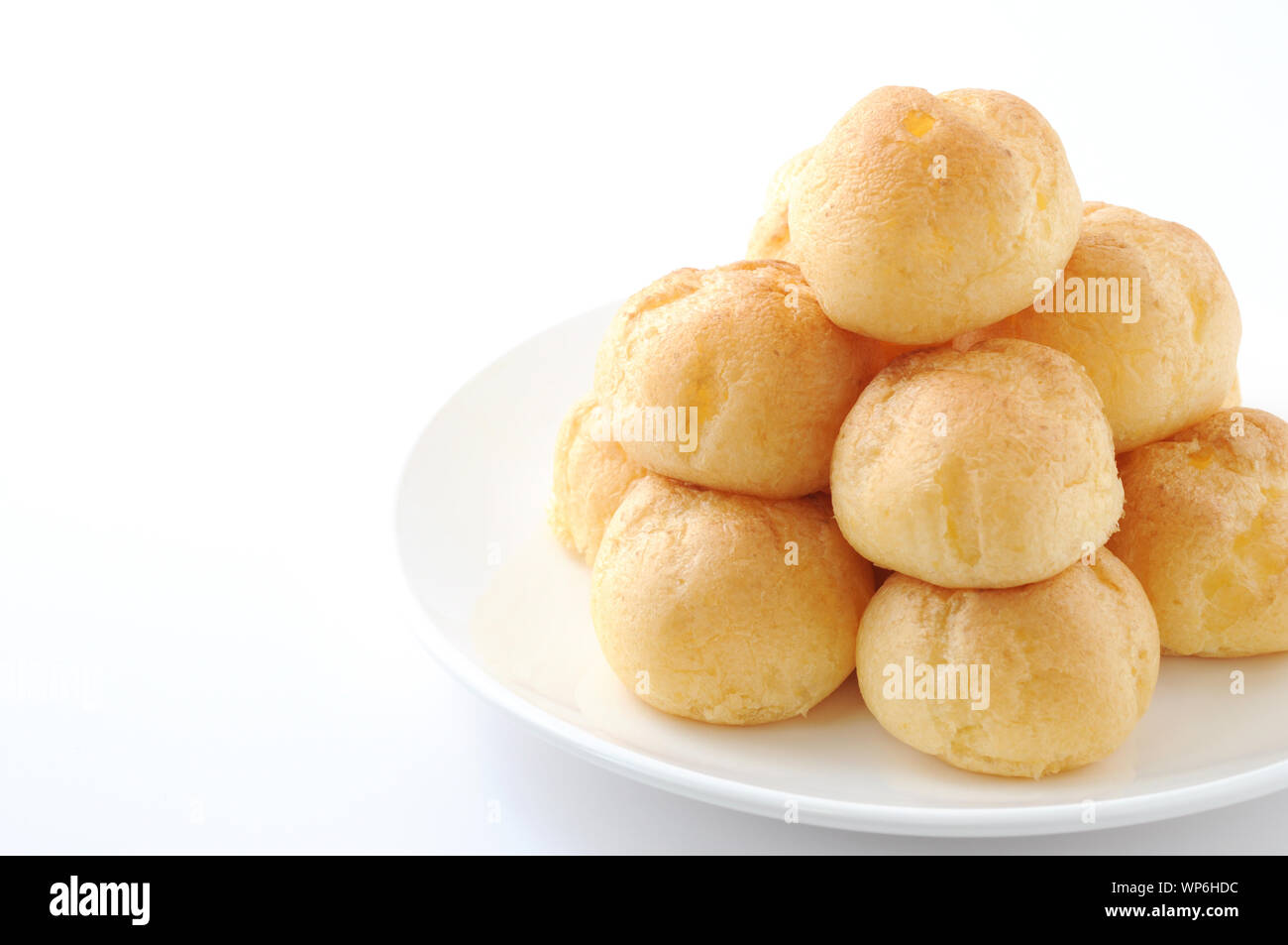 cream puffs closeup isolated on white background Stock Photo - Alamy