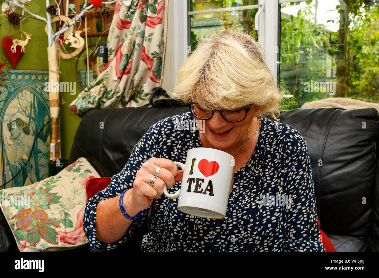 Artist Susie Hammond drinking tea Stock Photo - Alamy