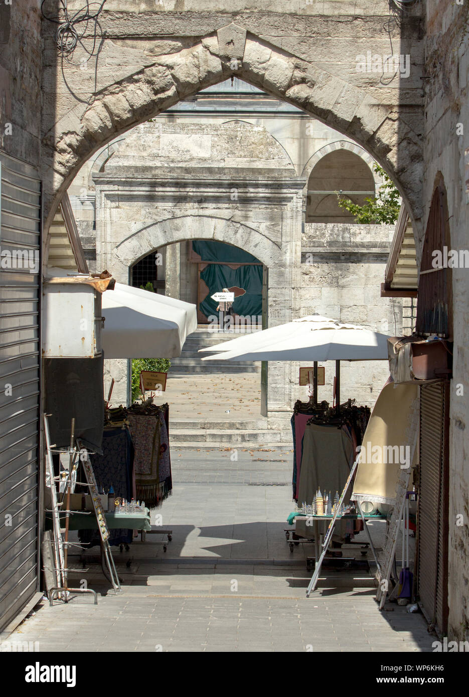 A historical passage in Suleymaniye with shops at the end Stock Photo ...