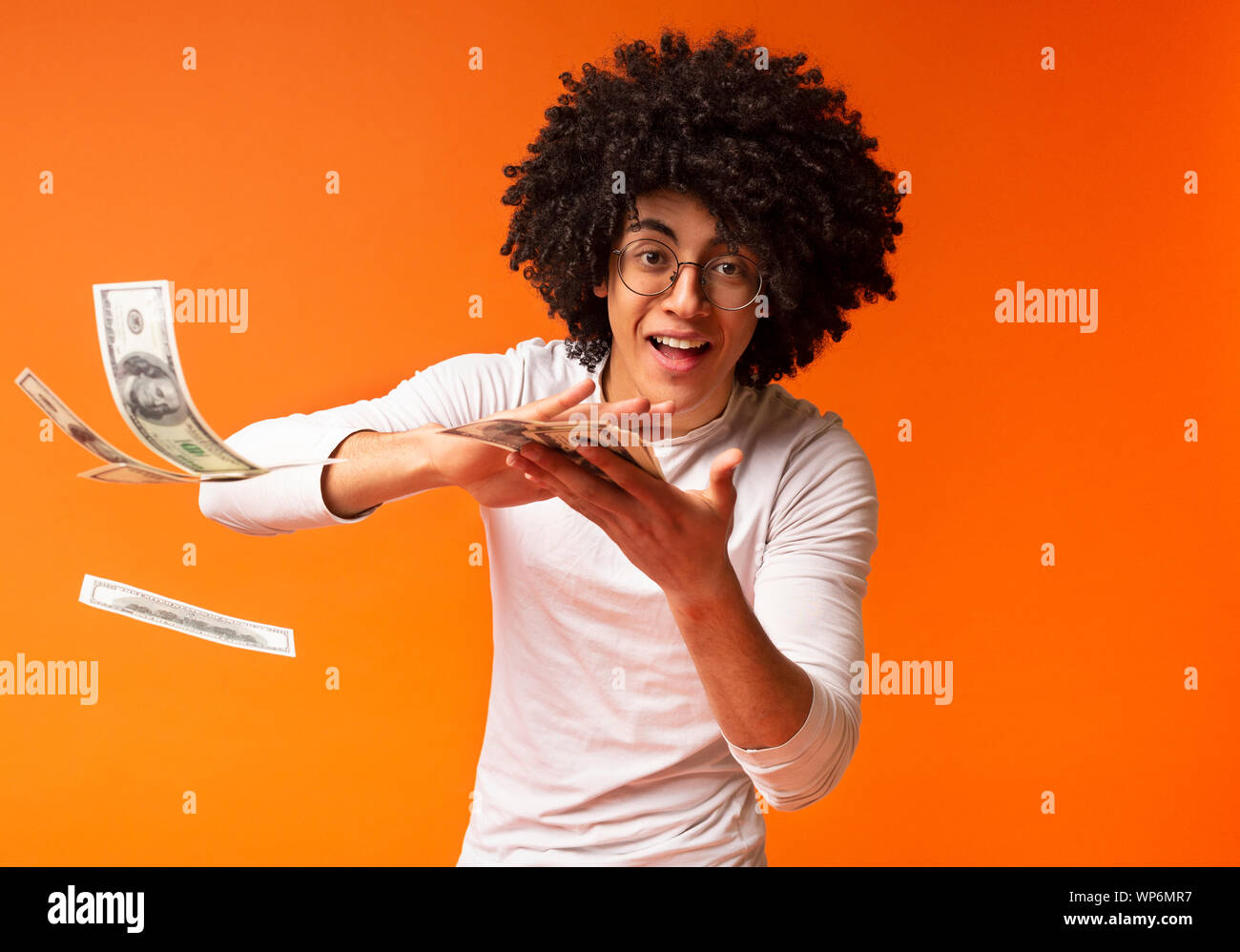 Young business throwing money concept hi-res stock photography and ...