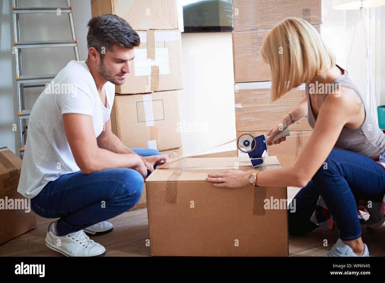 Unpacking boxes hi-res stock photography and images - Alamy