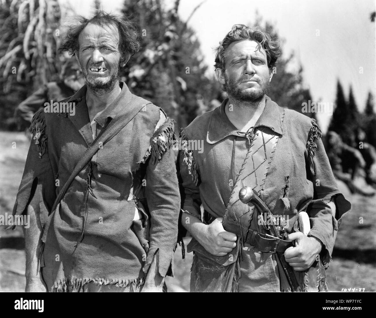 WALTER BRENNAN as Hunk Marriner and SPENCER TRACY as Major Robert ...