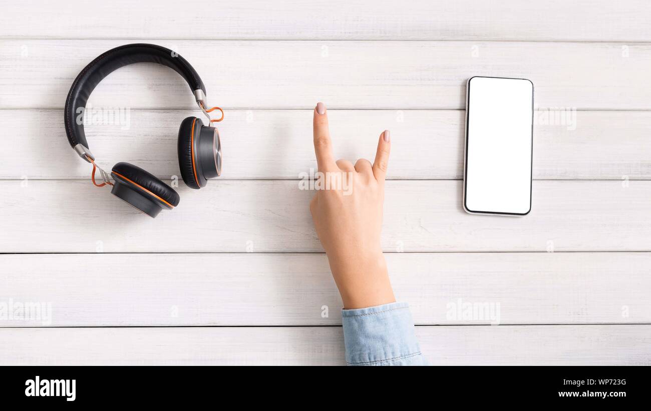 Woman making hand gesture rock hi-res stock photography and images - Alamy