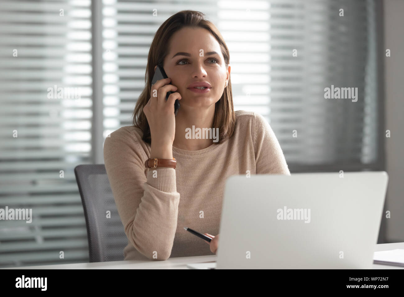Serious concerned corporate woman hi-res stock photography and images ...