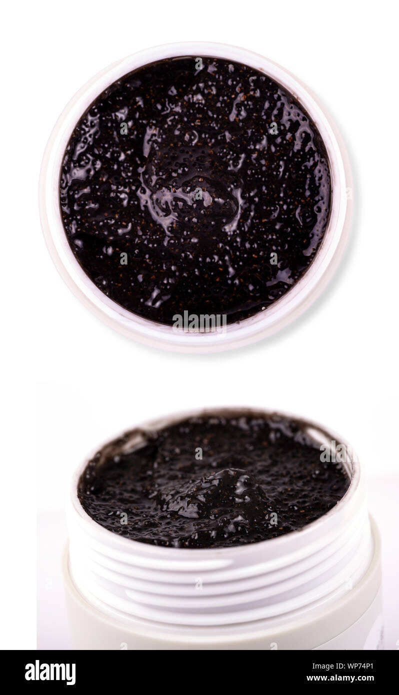 The black Body scrub in Jar on white background Stock Photo - Alamy