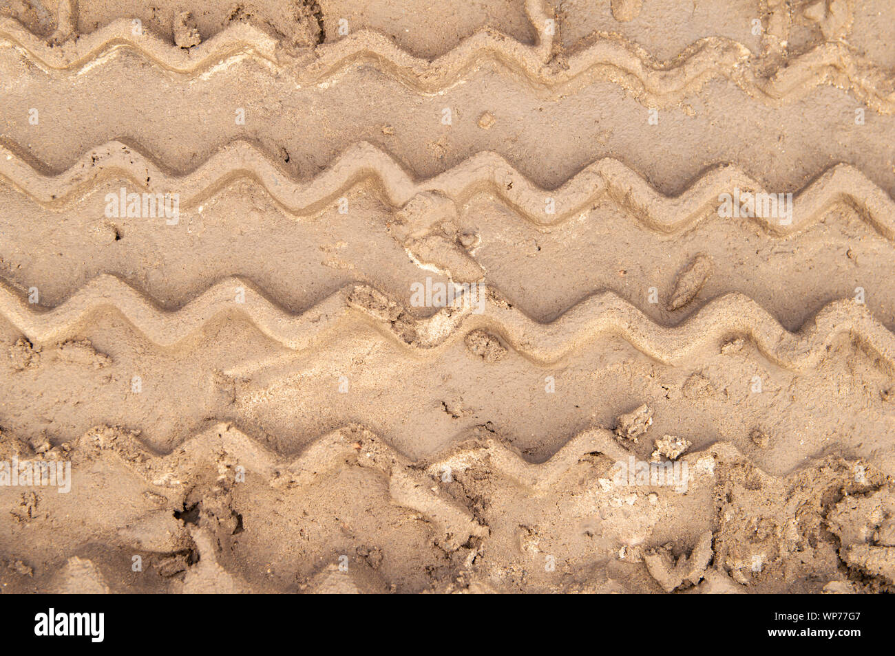 Texture of car wheel tread on the ground. Background Stock Photo - Alamy