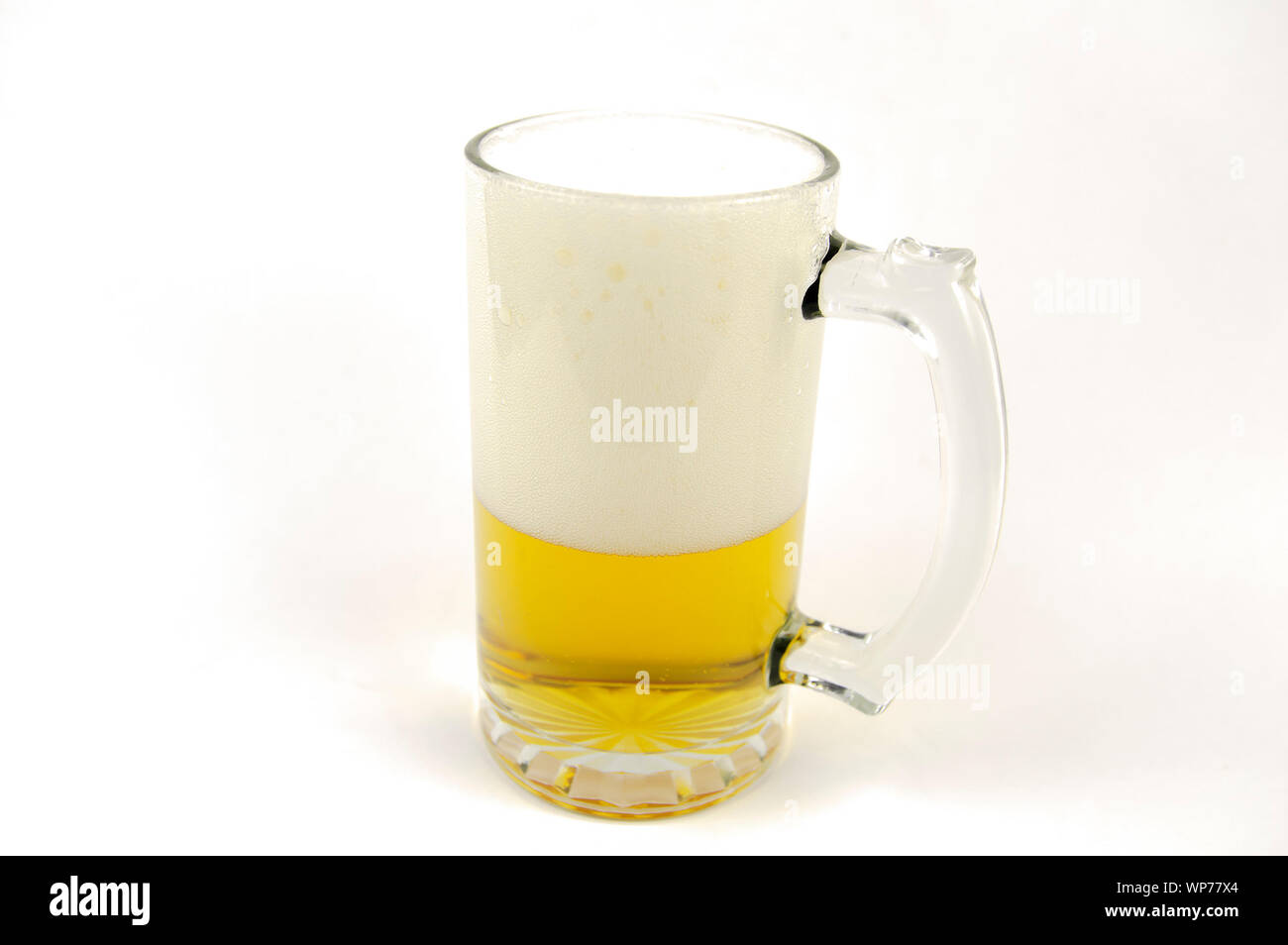Glass beer mug with foam on a white background Stock Photo - Alamy