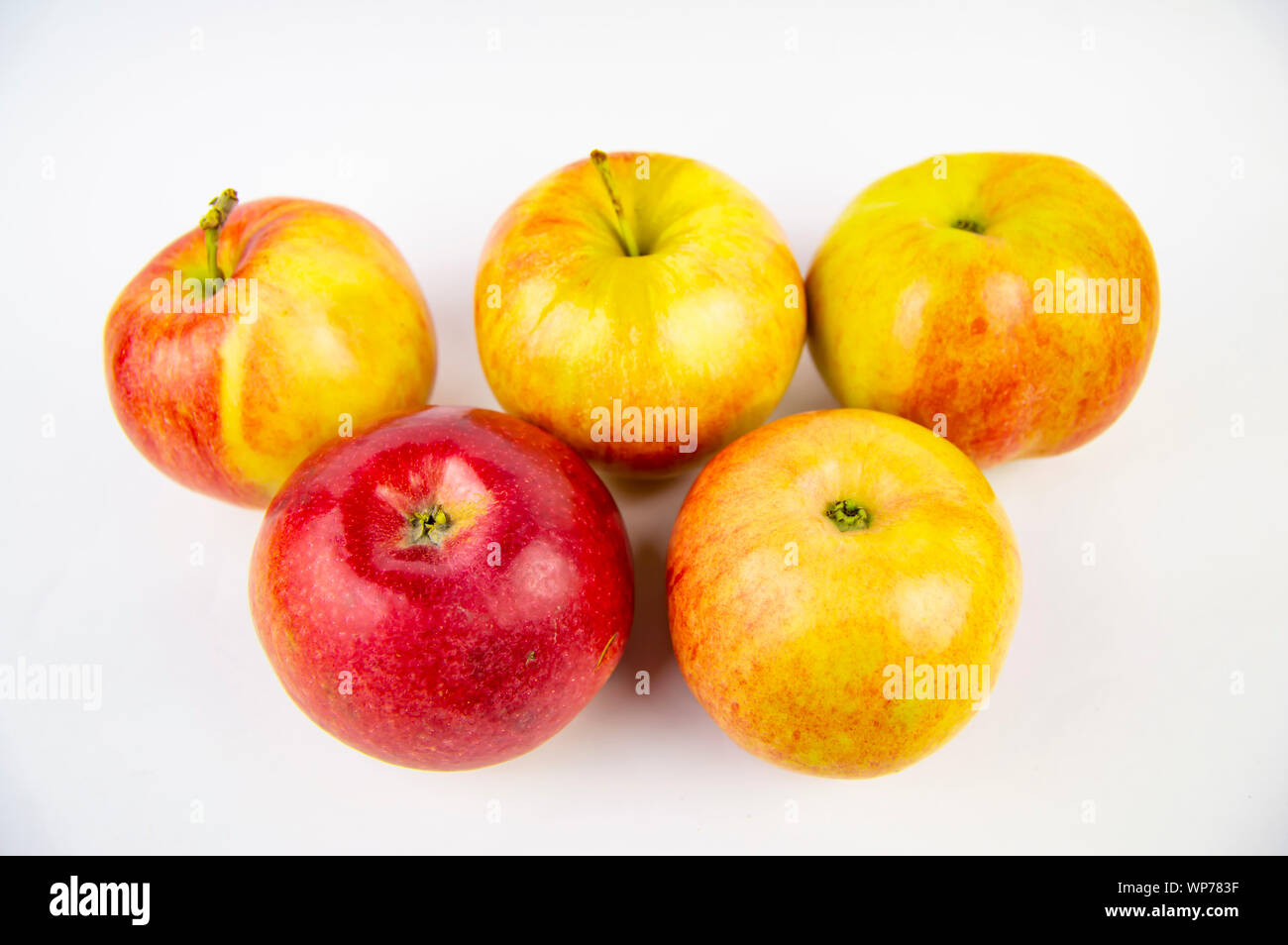 Red and yellow apples isolated on white background Stock Photo - Alamy
