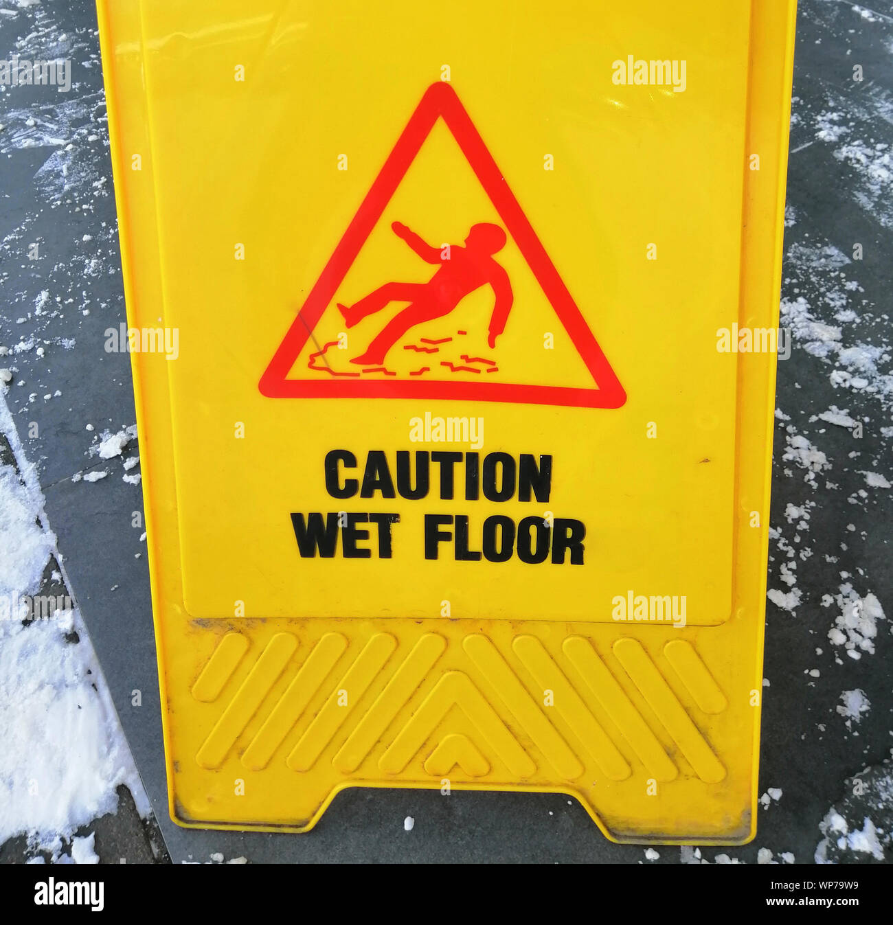 Caution pedestrians slippery when wet hi-res stock photography and ...