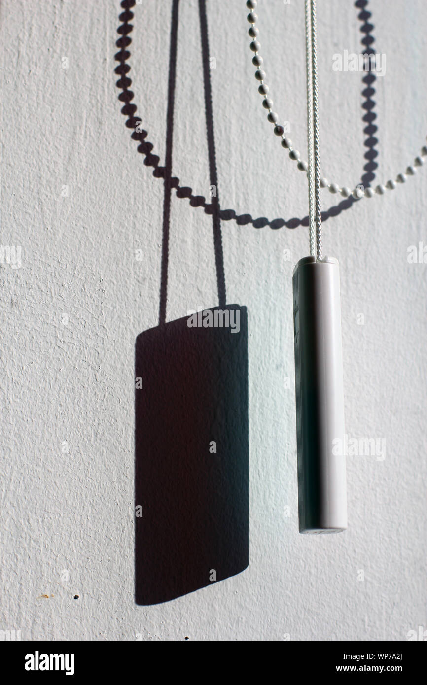 Abstract background with window blinds cord lift and chain projecting ...