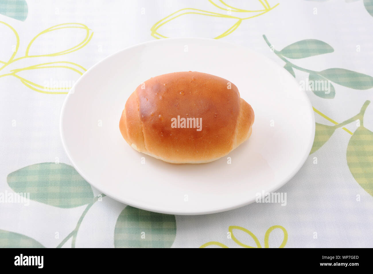 butter bread roll closeup isolated on white background Stock Photo - Alamy