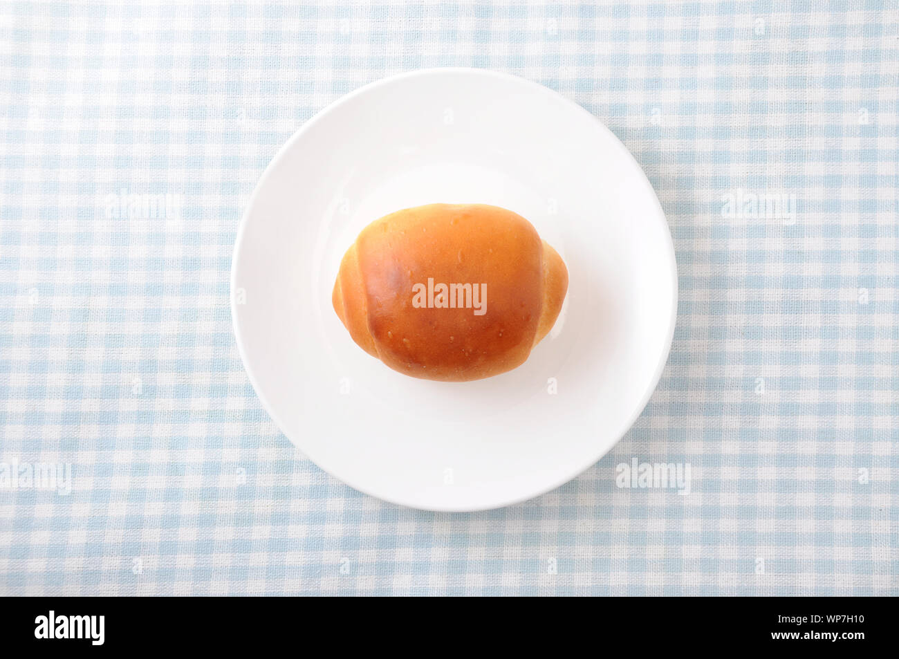 butter bread roll closeup isolated on white background Stock Photo - Alamy