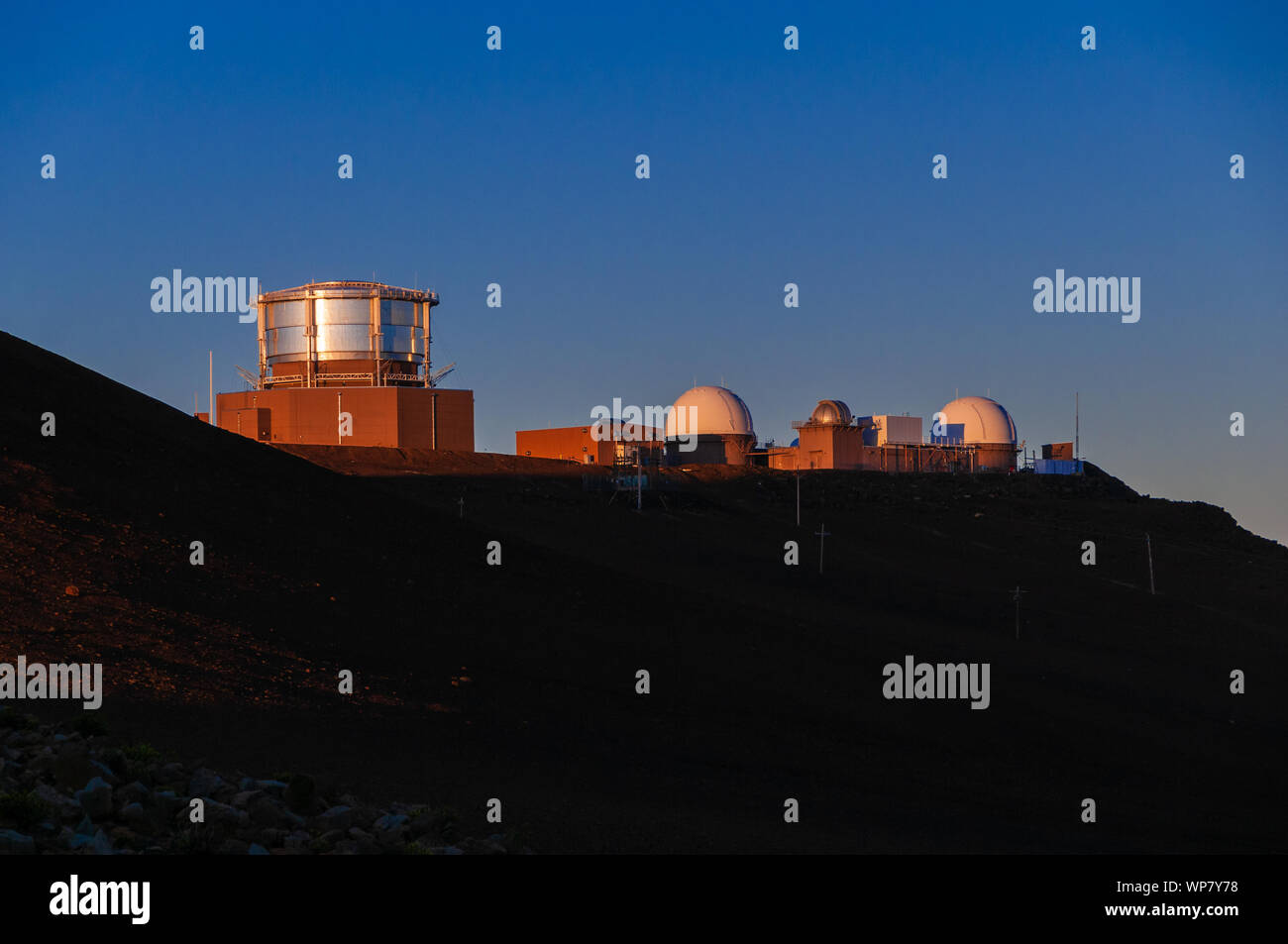 Space observatories at sunrise on top of Haleakala crater on Maui ...