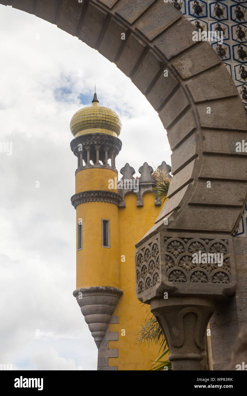Arabian style domed yellow tower viewed through arch at the 19th ...