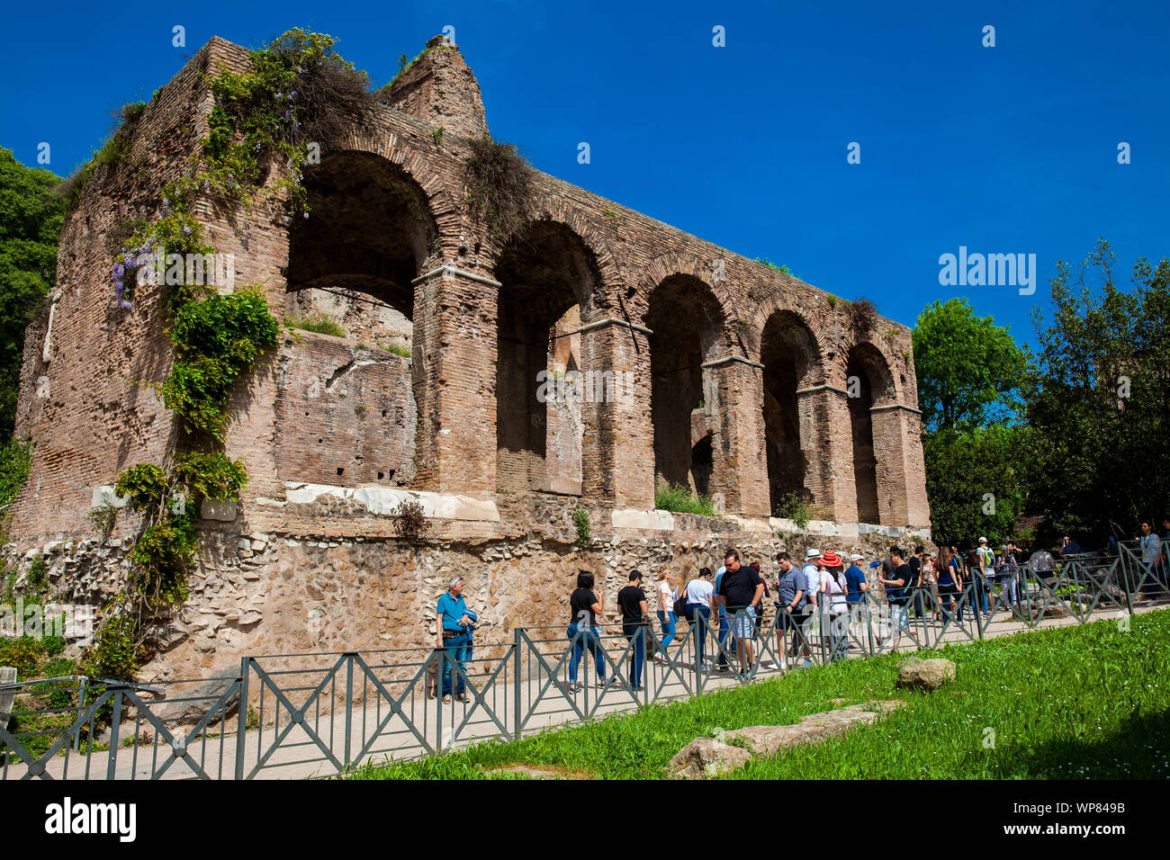 ROME, ITALY - APRIL, 2018: Tourists visiting the ruins of the Medieval ...