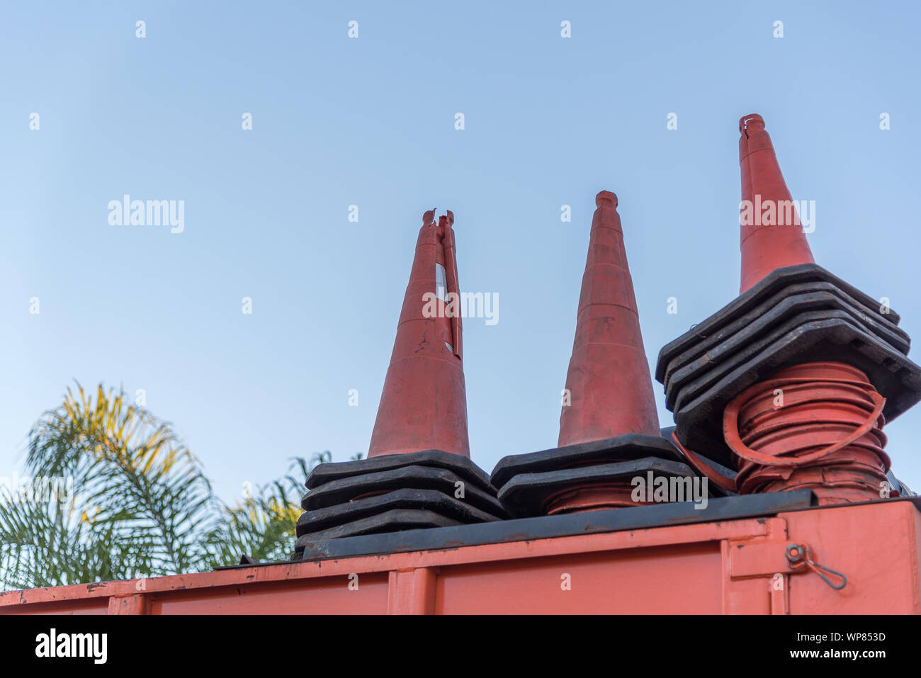 A set of traffic signalling cones stacked on a truck. Cones used for ...