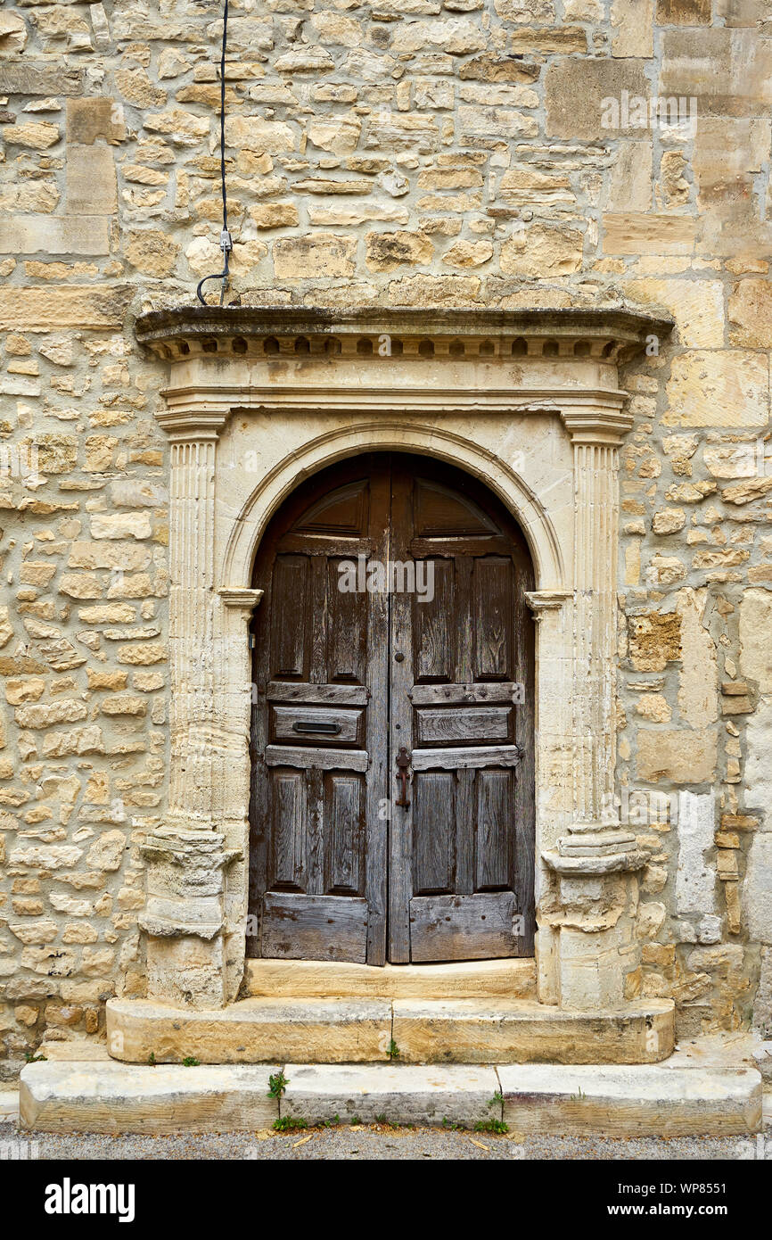 Old Church Porch With Wooden Door And Stone Wall At Barjac Occitanie ...