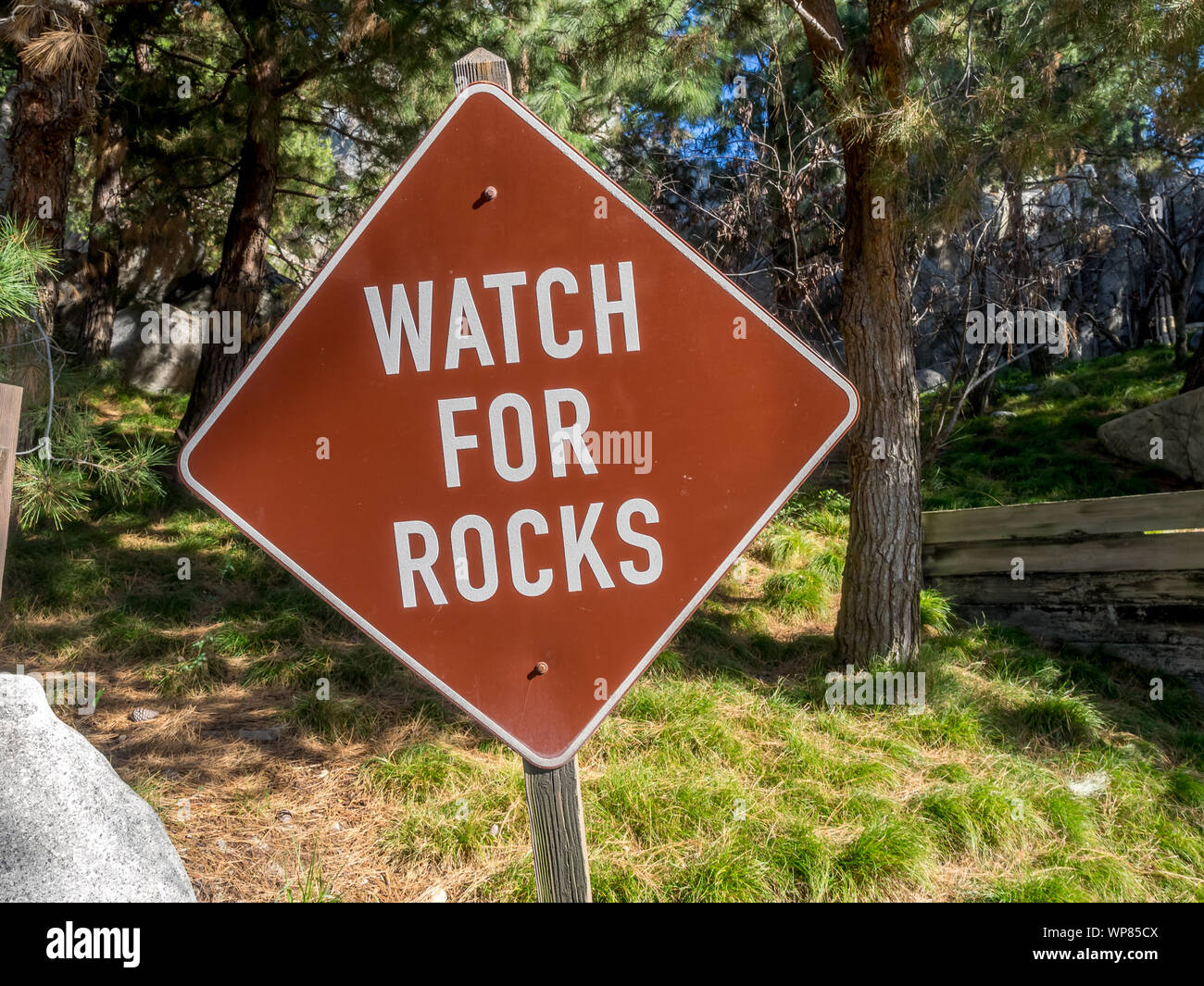 Watch for rocks sign Stock Photo - Alamy