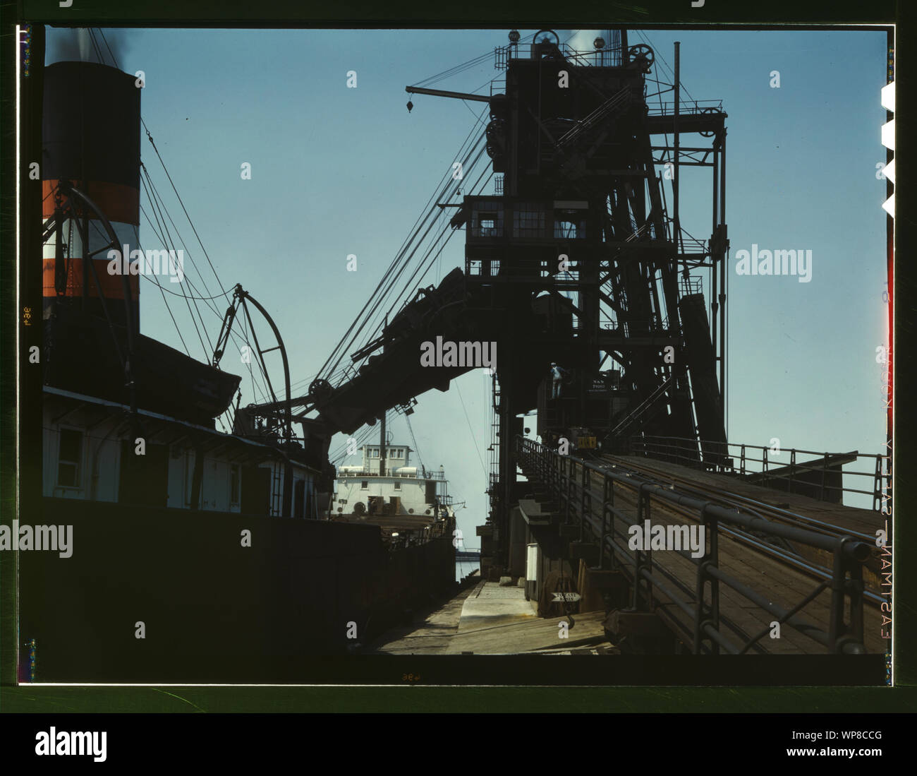 Loading a lake freighter with coal for shipment to other lake ports ...