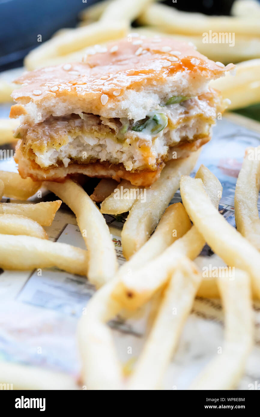 Close-up of unfinished leftover burger Stock Photo - Alamy