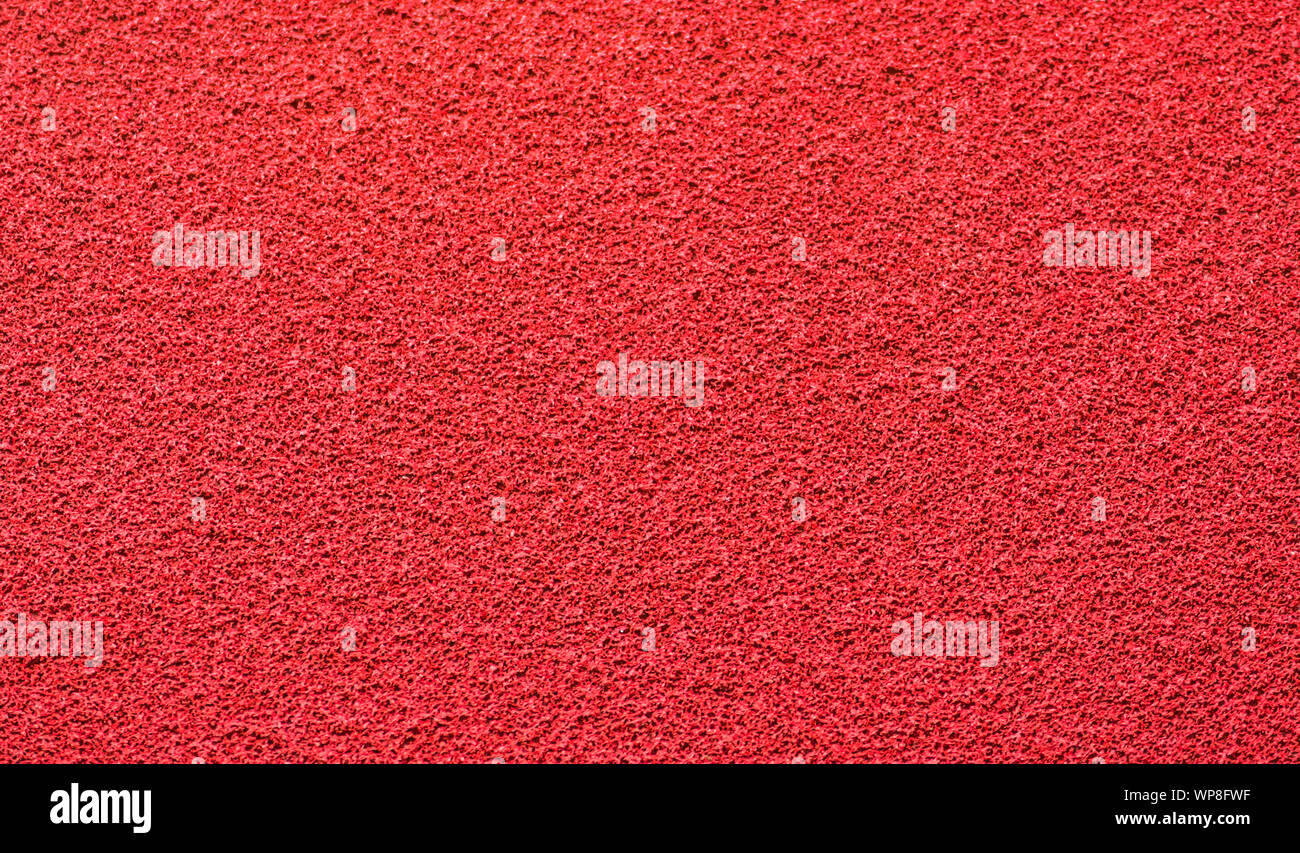 Rough surface wall painted red Stock Photo - Alamy