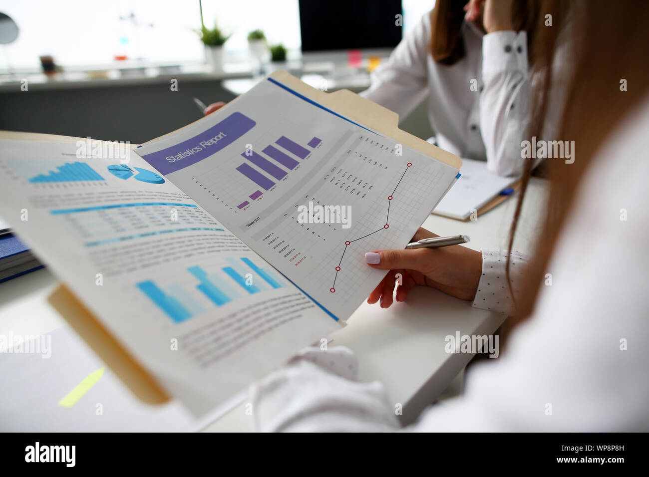 Group people hol business chart in hand on seminar Stock Photo - Alamy
