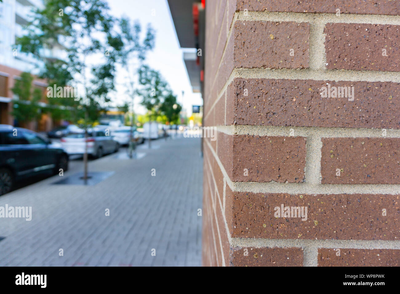 Brick wall on street Corner in downtown Calgary Stock Photo - Alamy
