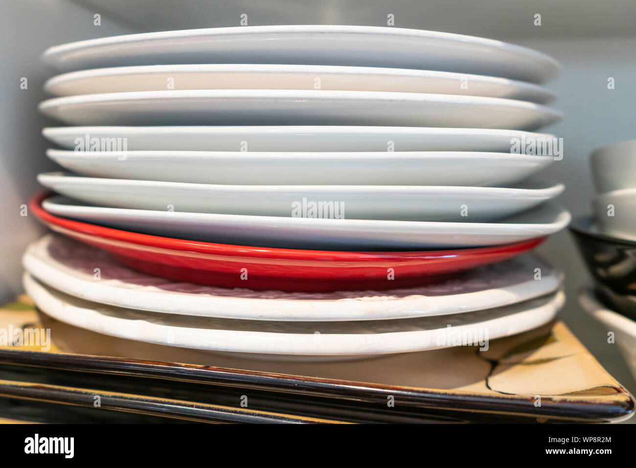 China plates stack hi-res stock photography and images - Alamy