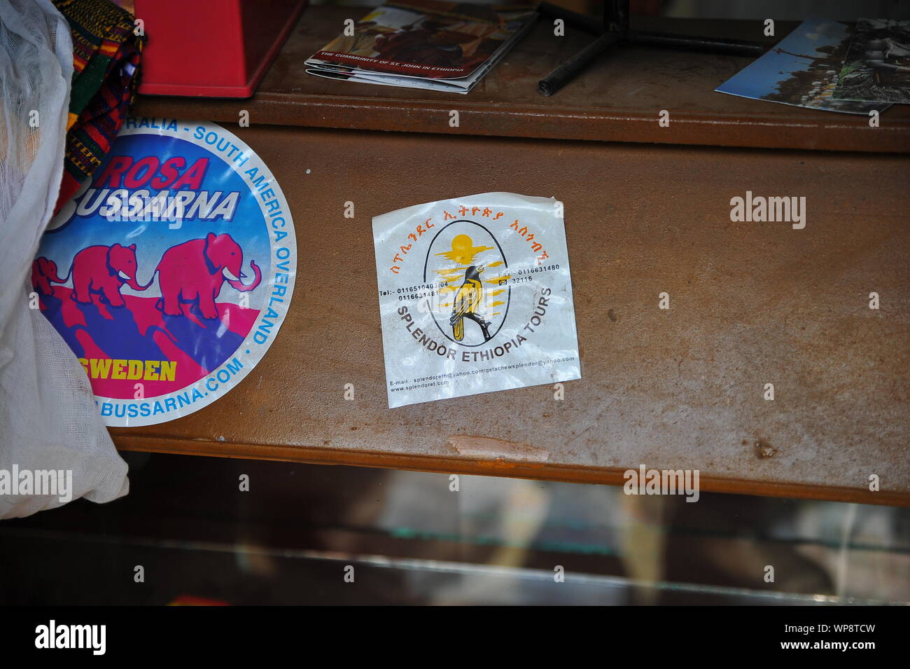 Advertising on a travel agency counter Stock Photo - Alamy
