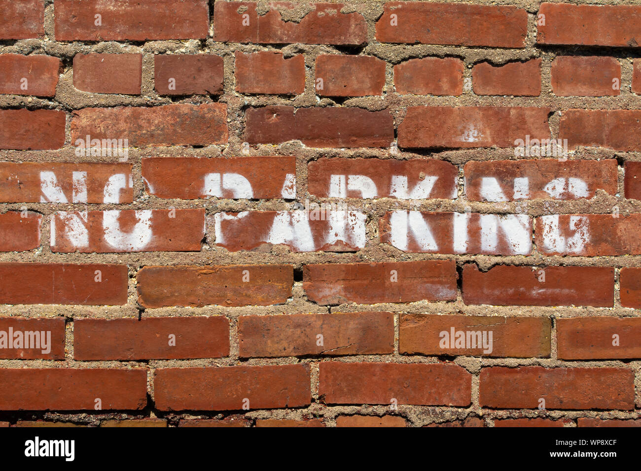 Old brick wall in back lot Stock Photo - Alamy