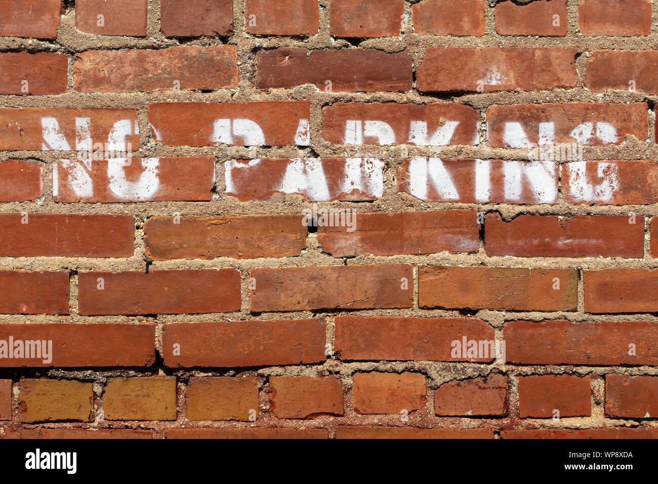 Old brick wall in back lot Stock Photo - Alamy