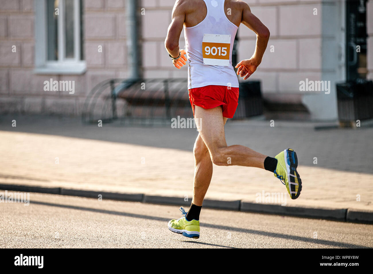 man athlete runner run marathon on city in soft sunlight Stock Photo ...