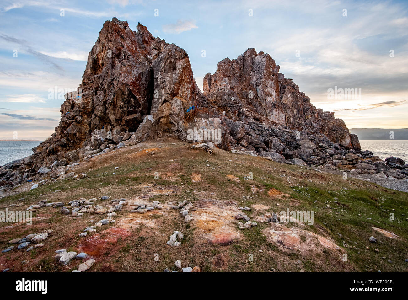 View of the high rocky stones of the Shamanka rock against the sky with ...