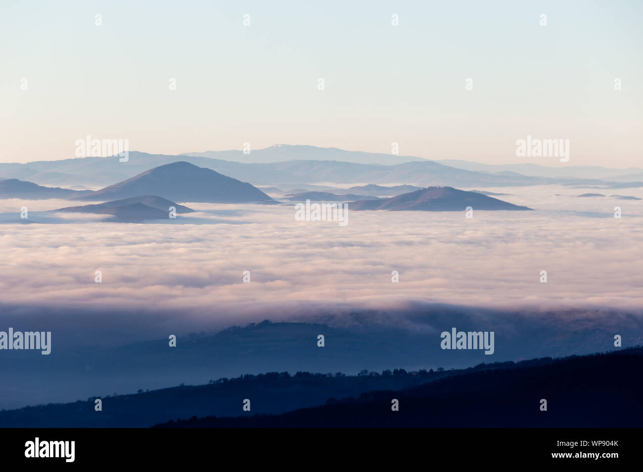 Sea of fog and mountains at the distance Stock Photo - Alamy