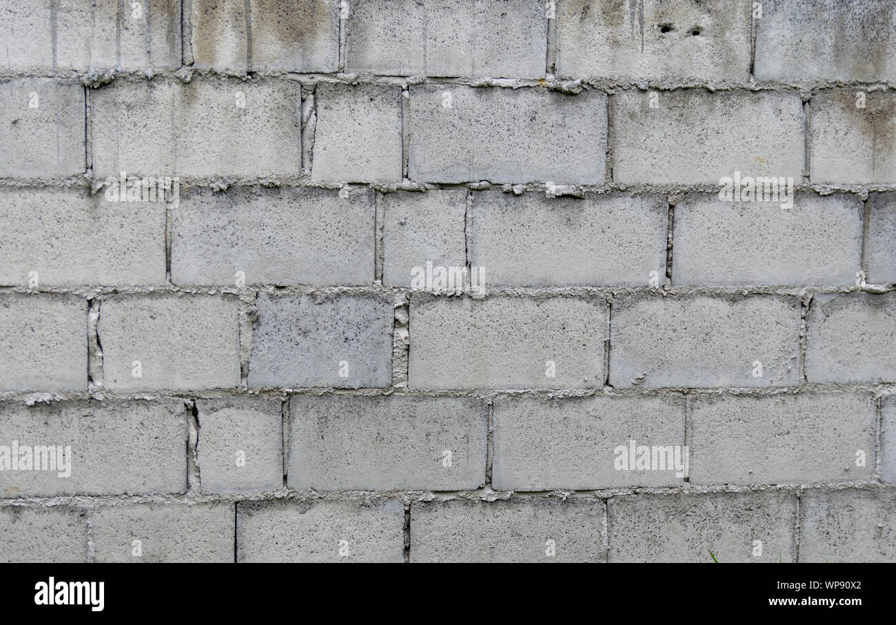 Dirty grey white brick wall Stock Photo - Alamy