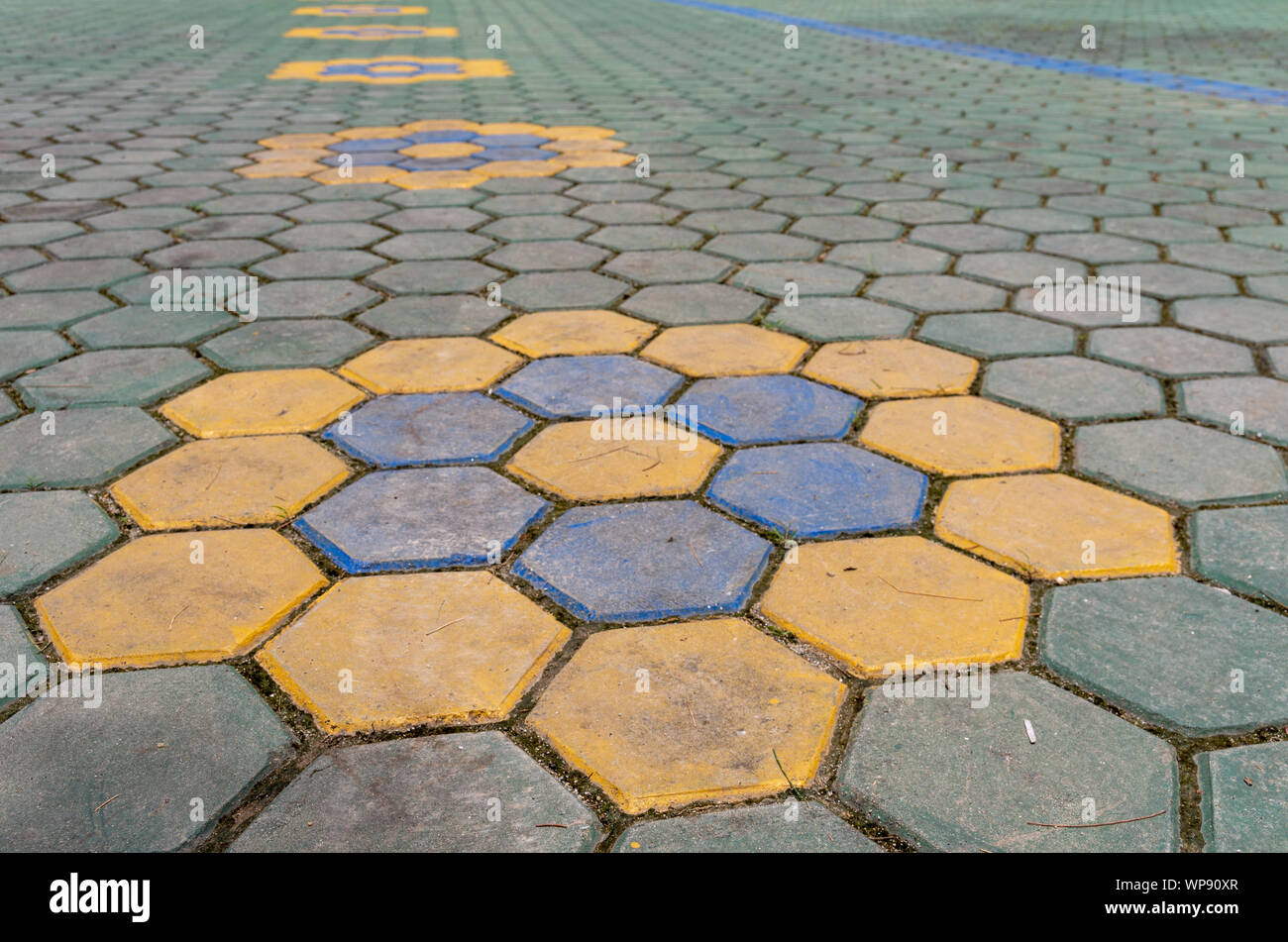 Hexagonal stone floor with mosaic Stock Photo - Alamy