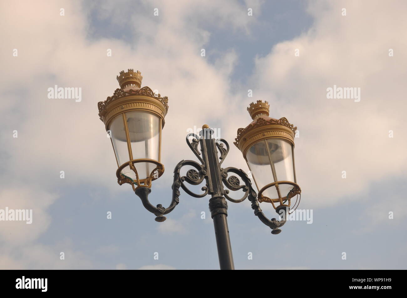 High pillar of street lighting Stock Photo - Alamy