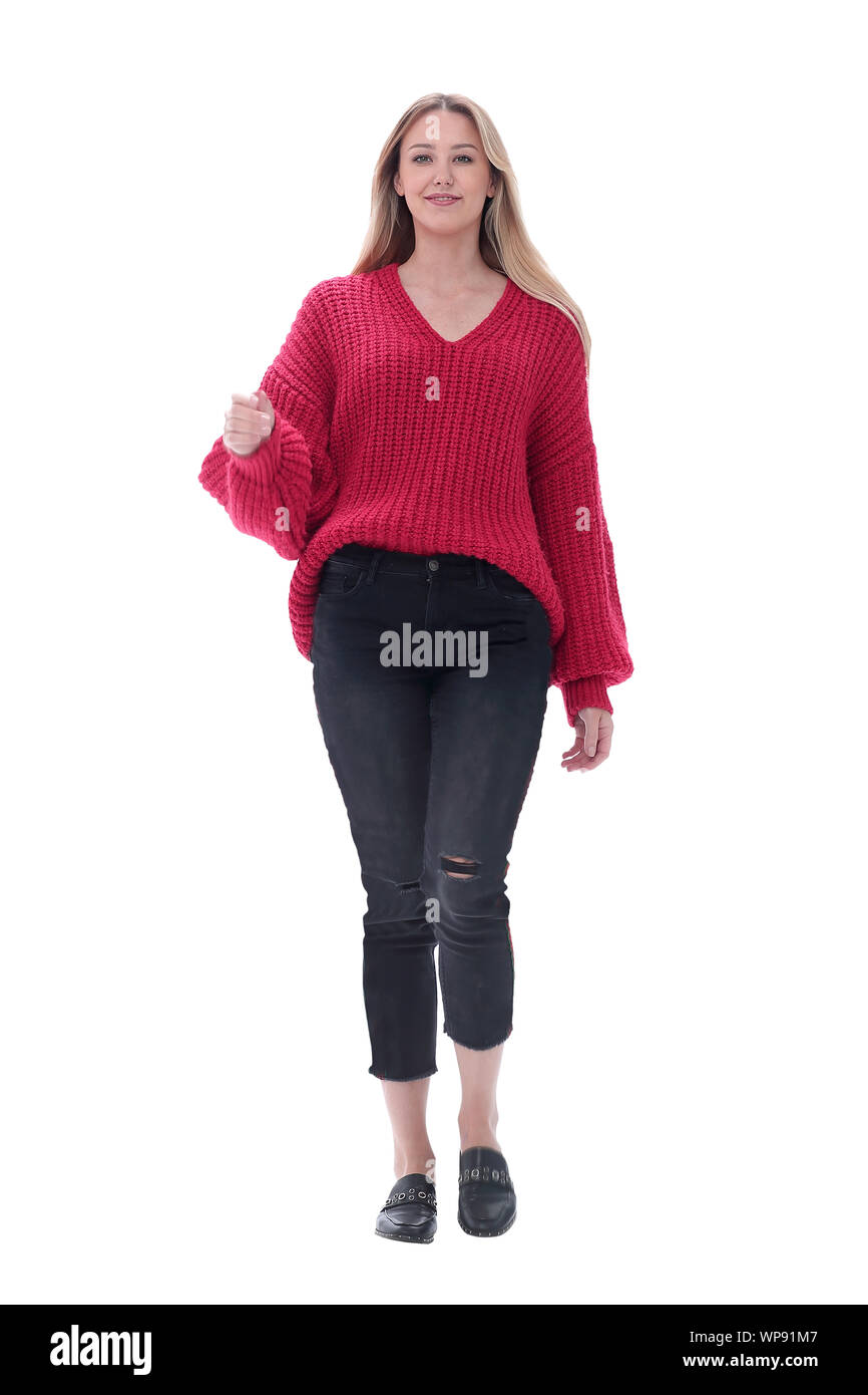 confident young woman walks forward. isolated on white Stock Photo - Alamy