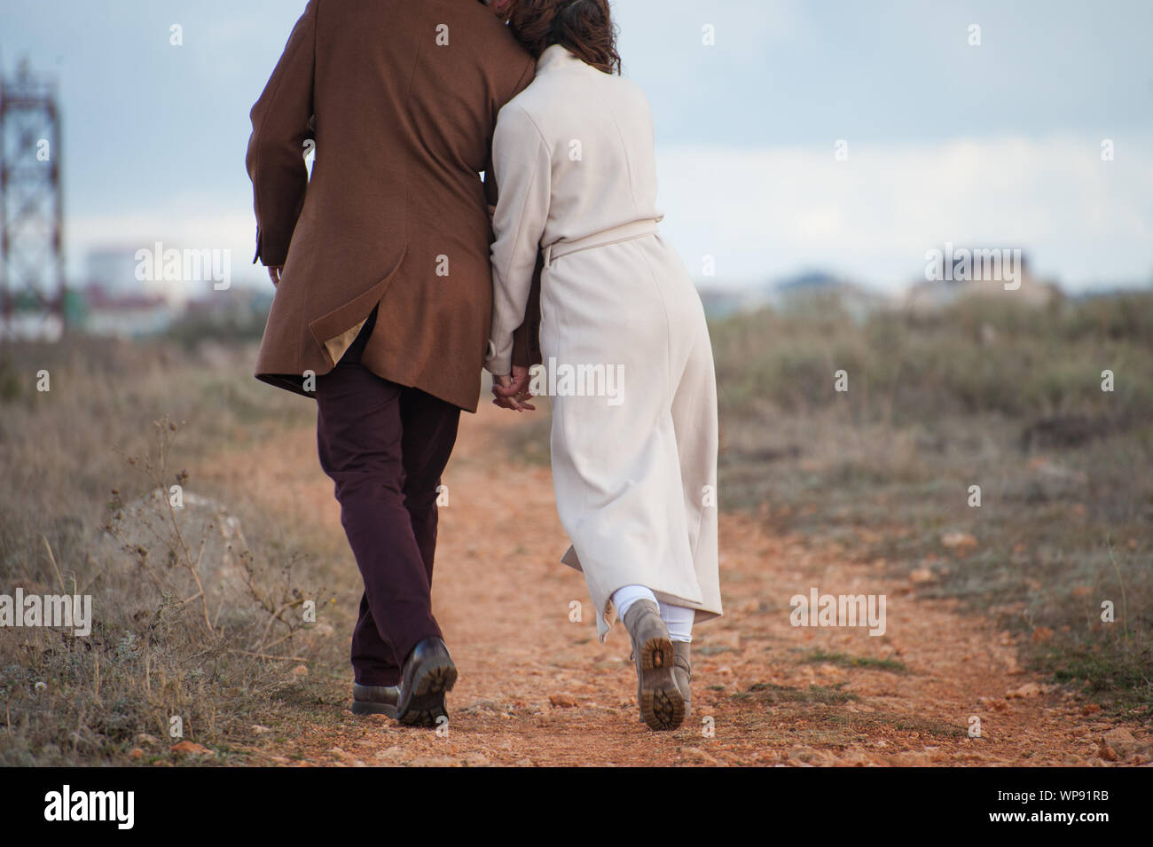 Lovers Holding Hands Walking