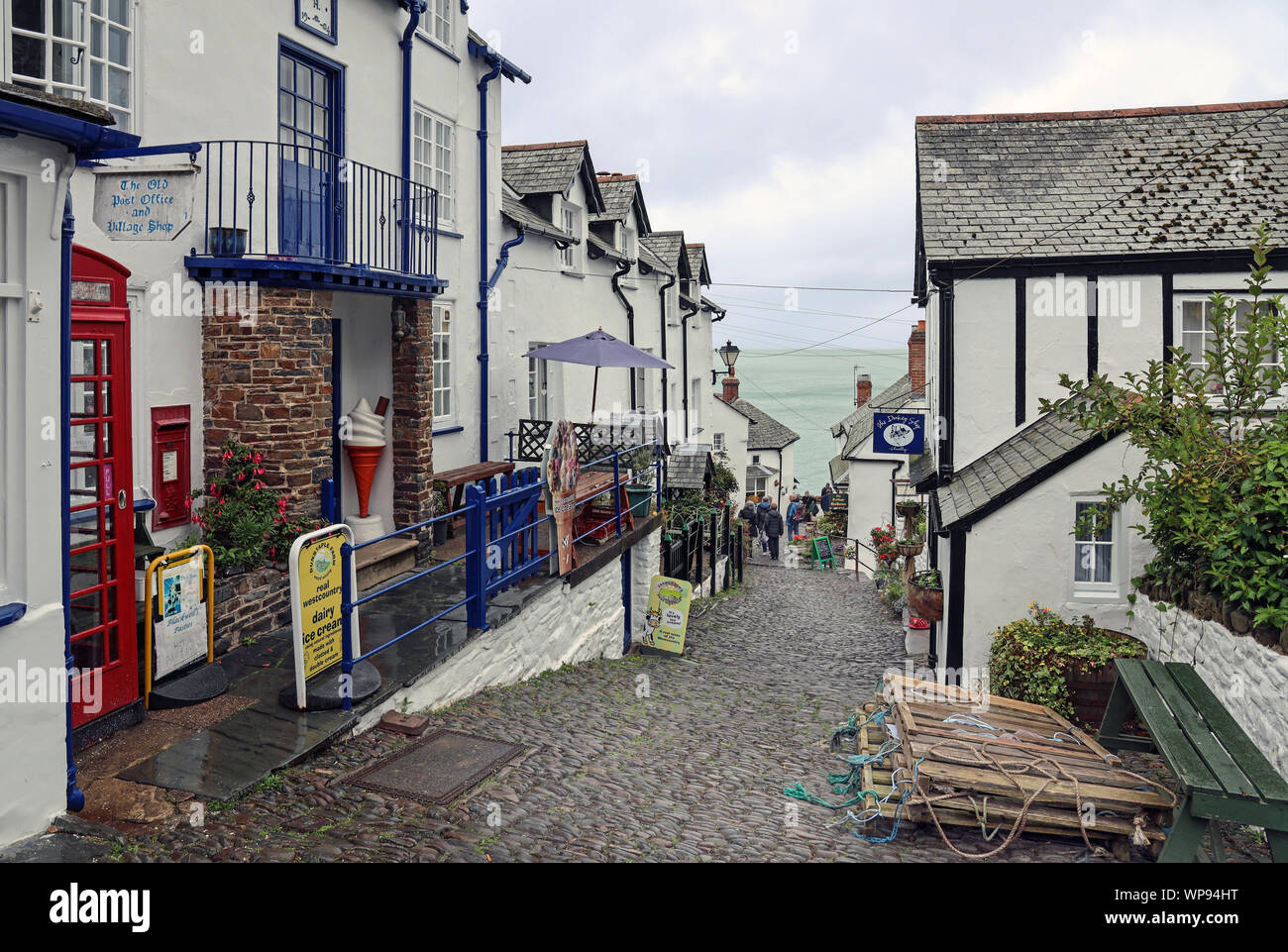 The cobbled main street at Clovelly, with handy sledges to take heavy ...