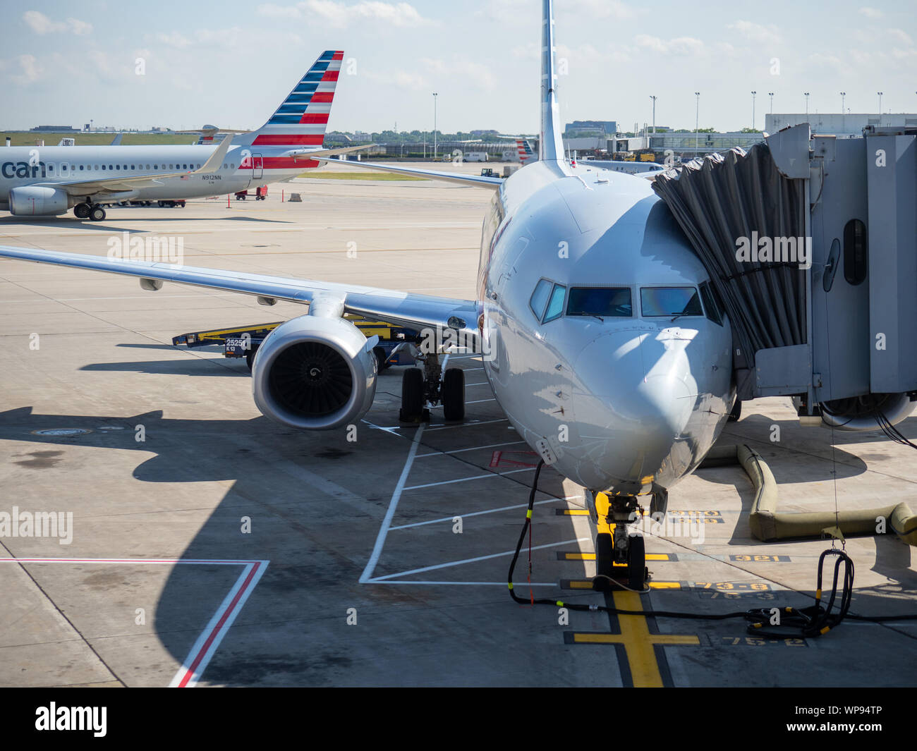 American Airlines plane connected to terminal for boarding Stock Photo ...