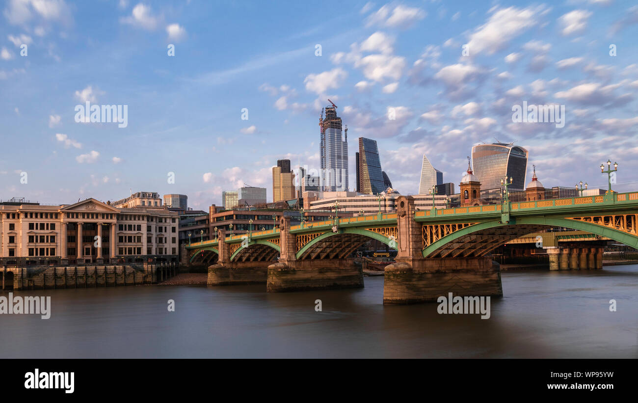 Southwark Bridge in London near riverside Stock Photo - Alamy