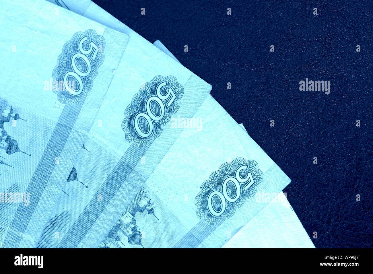 Banknote background from Russian rubles close up. Blue color toned ...