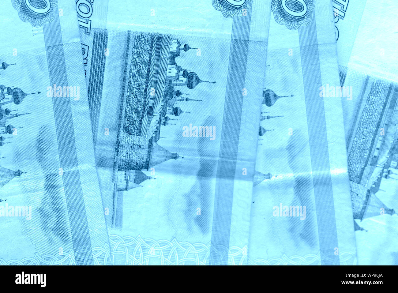 Banknote background from Russian rubles close up. Blue color toned ...