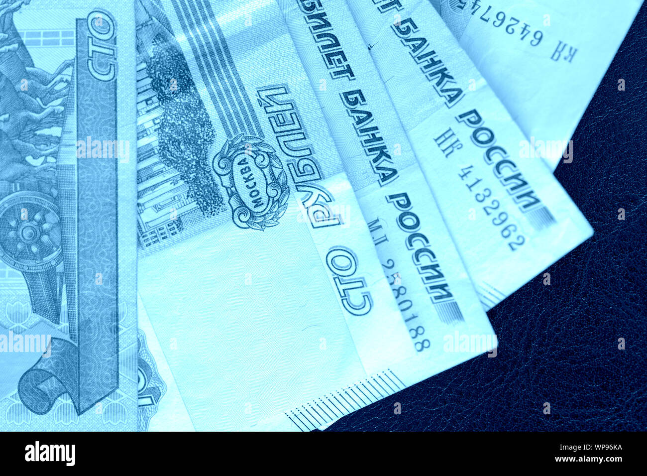 Banknote background from Russian rubles close up. Blue color toned ...