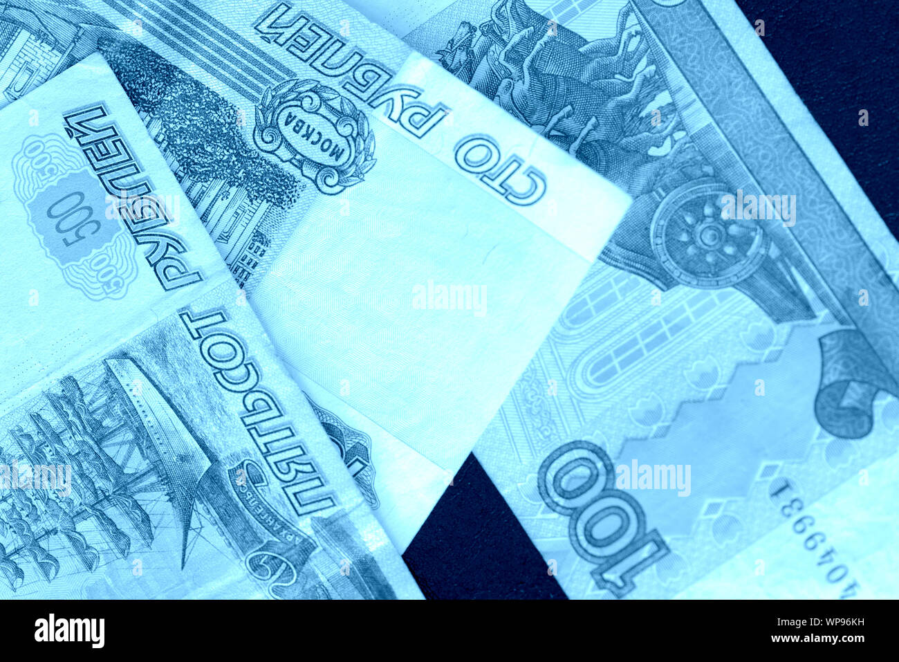 Banknote background from Russian rubles close up. Blue color toned ...