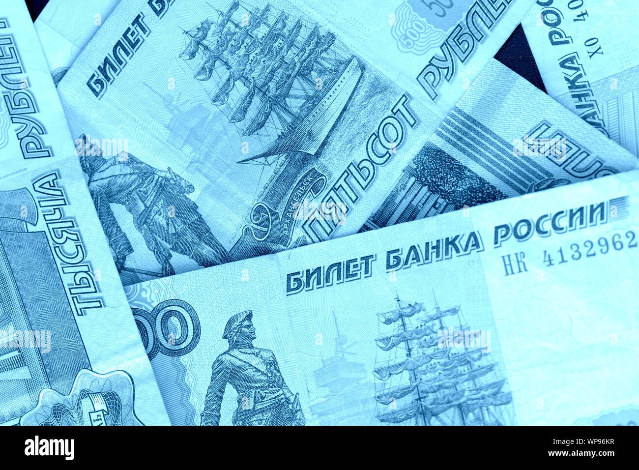 Banknote background from Russian rubles close up. Blue color toned ...