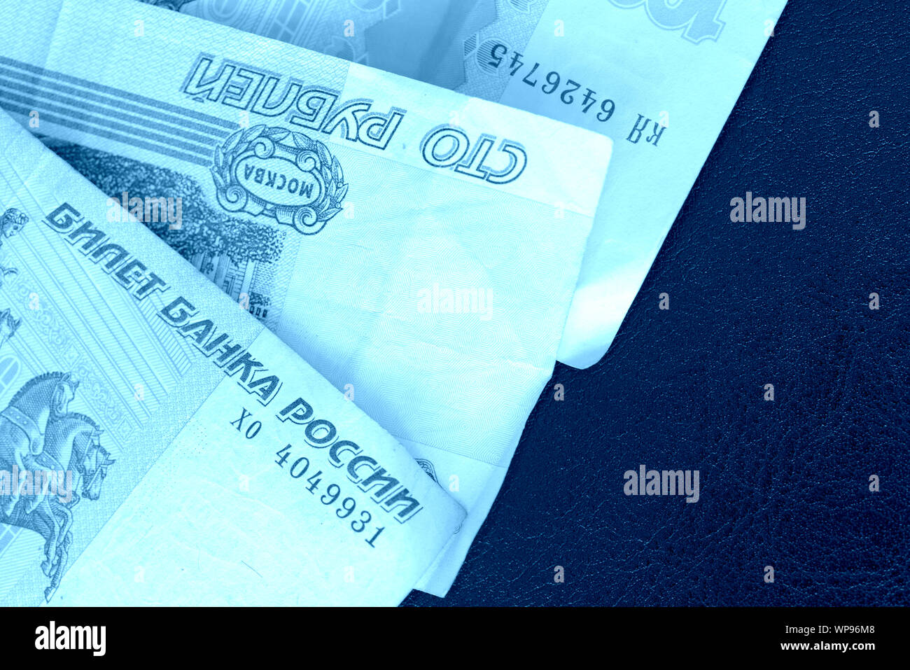 Banknote background from Russian rubles close up. Blue color toned ...