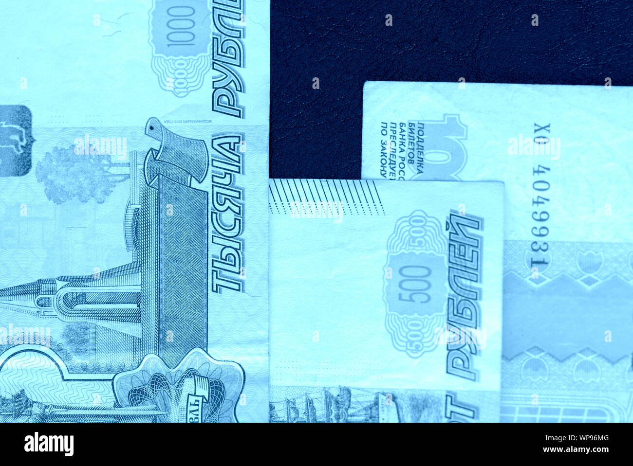 Banknote background from Russian rubles close up. Blue color toned ...